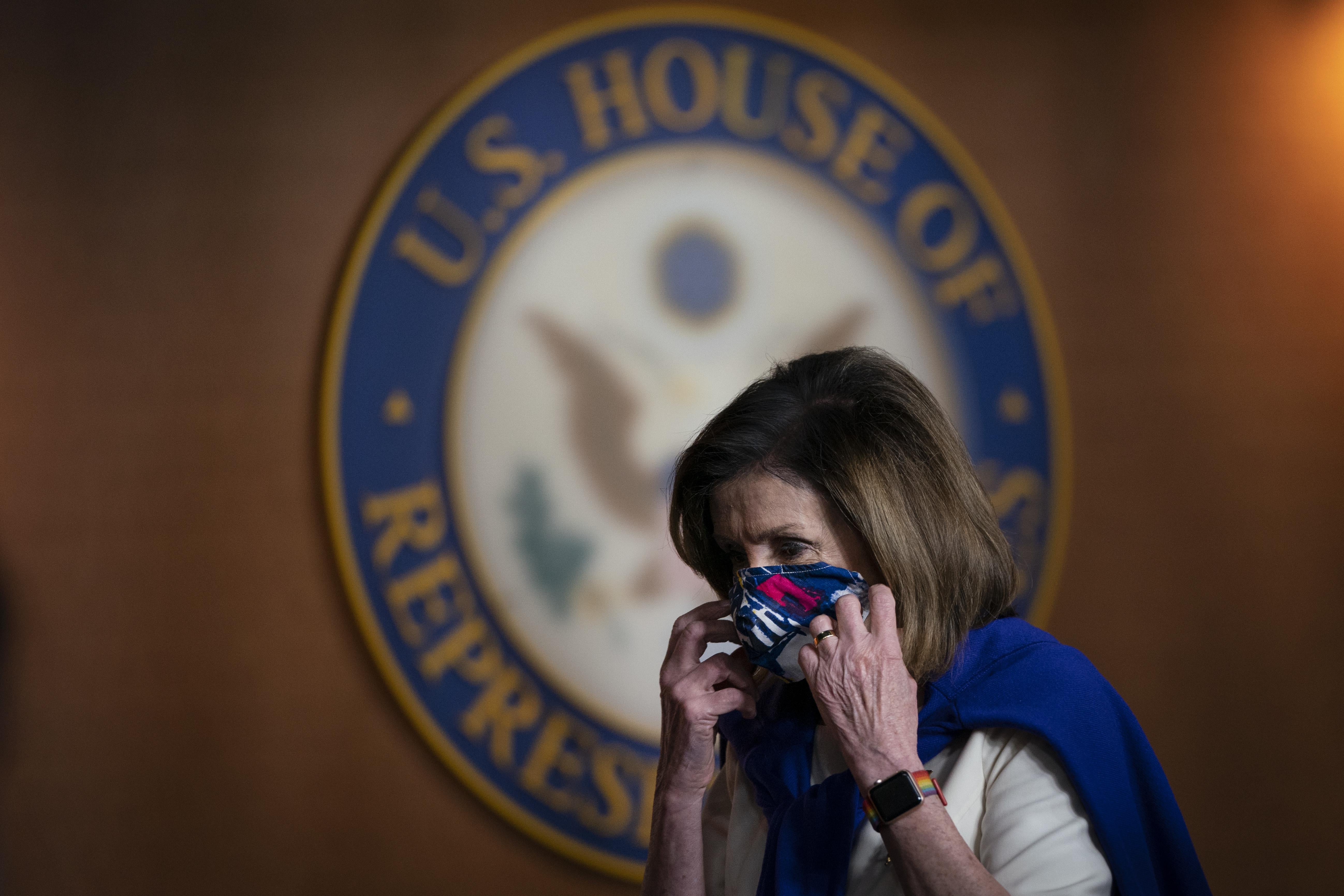 Pelosi makes masks mandatory on House floor.