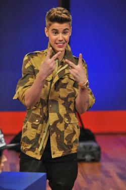 The "up yours" gesture looks like a peace sign.