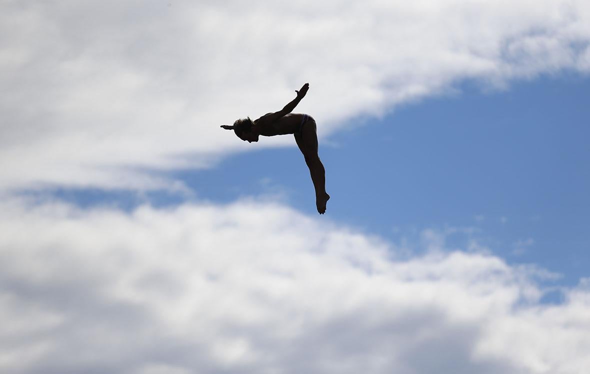 High diving and border crossing: This week in pictures.