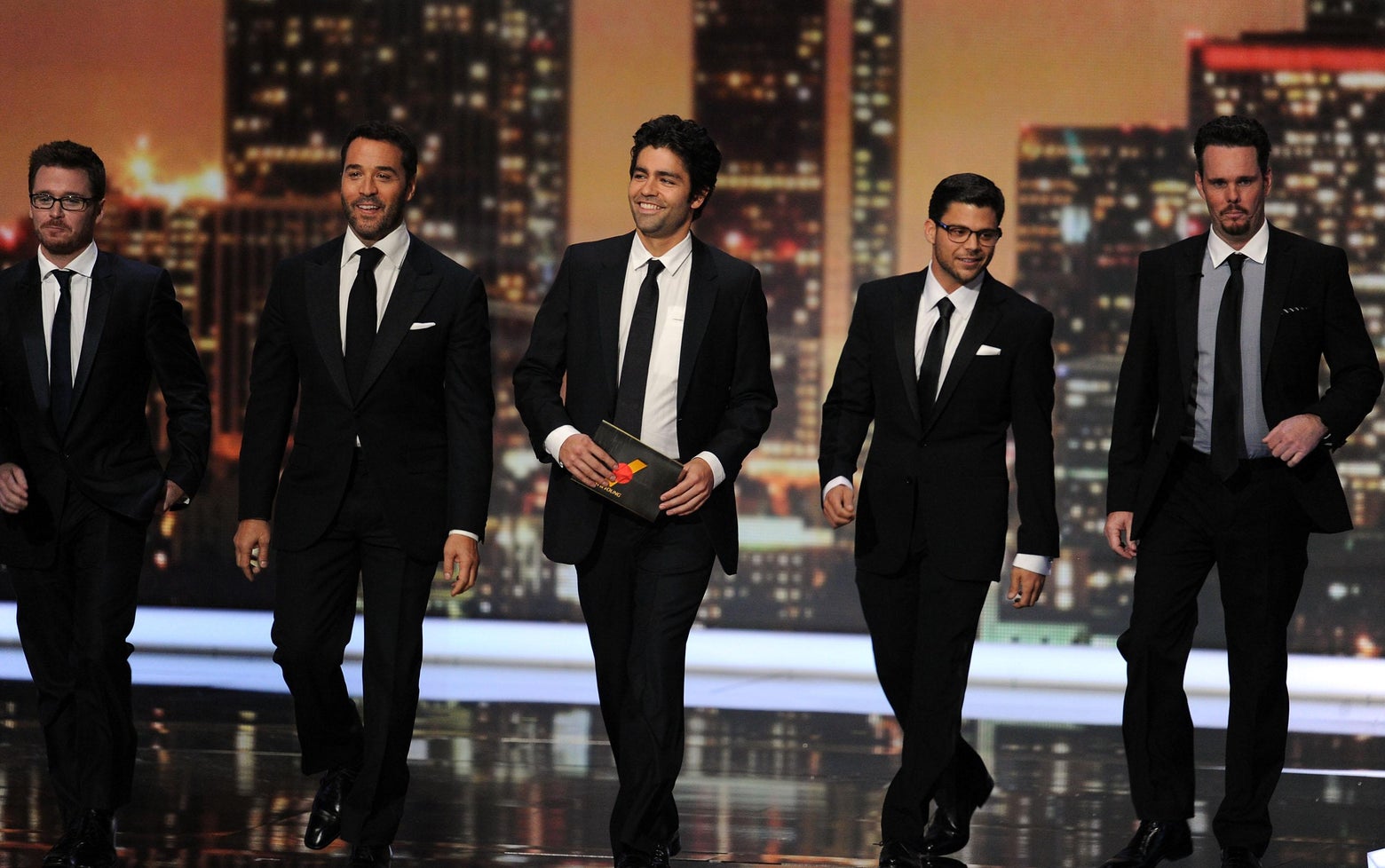 Emmy Awards 2011: Entourage stars accept award for Dame Maggie Smith