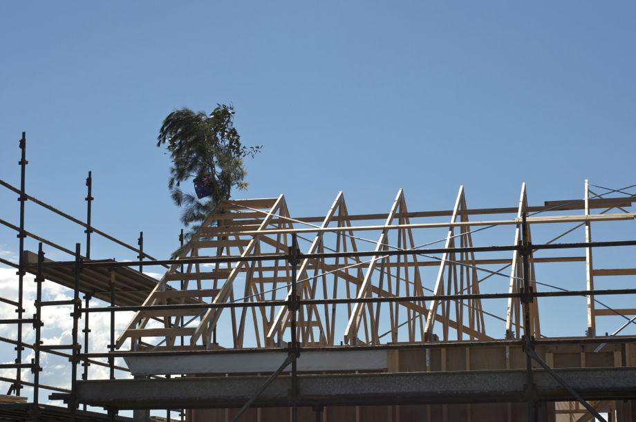 Why do construction workers top building sites with undecorated ...