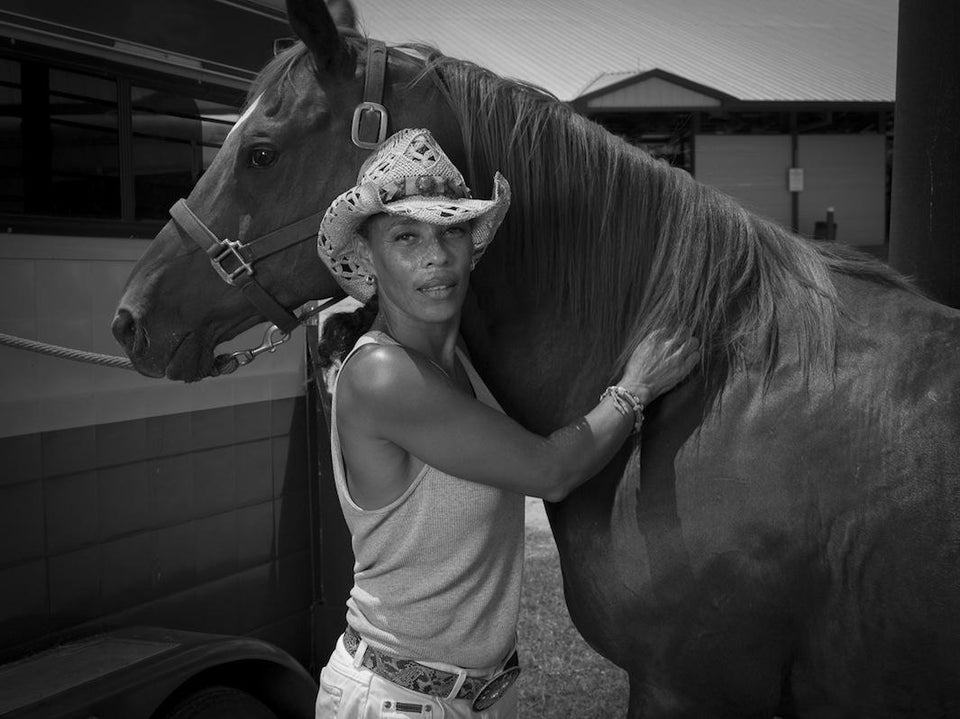 Forest McMullin photographs attendees at the Bill Pickett Invitational ...