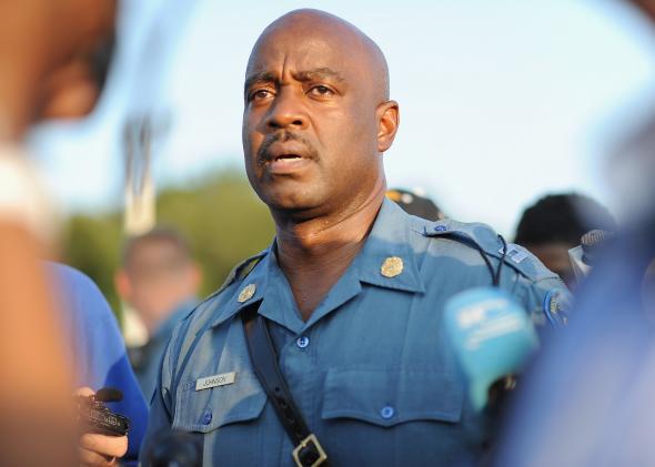Ferguson Highway Patrol Captain Ron Johnson flashes Kappa Alpha Psi ...