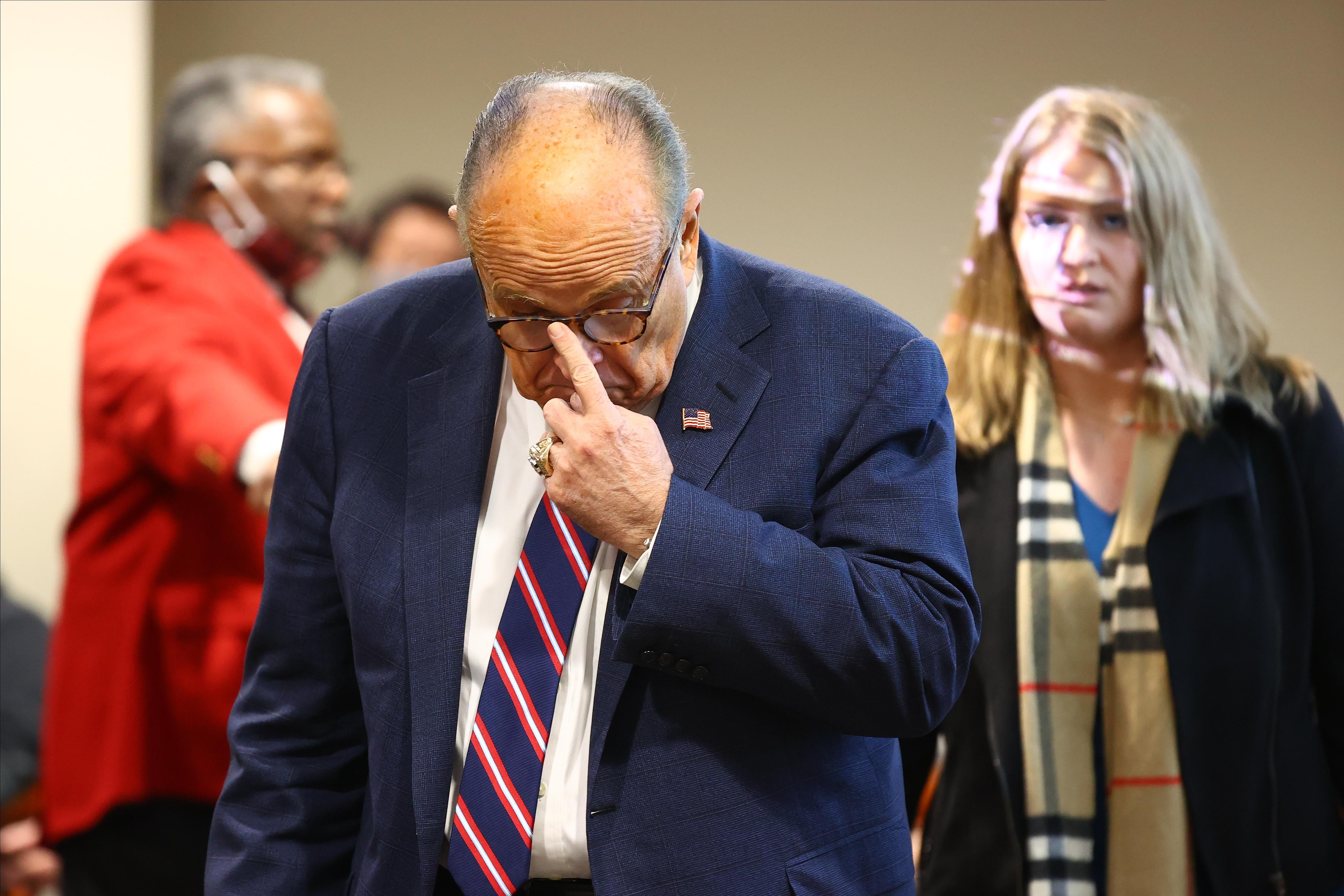 Federal investigators search Rudy Giuliani’s home and office.