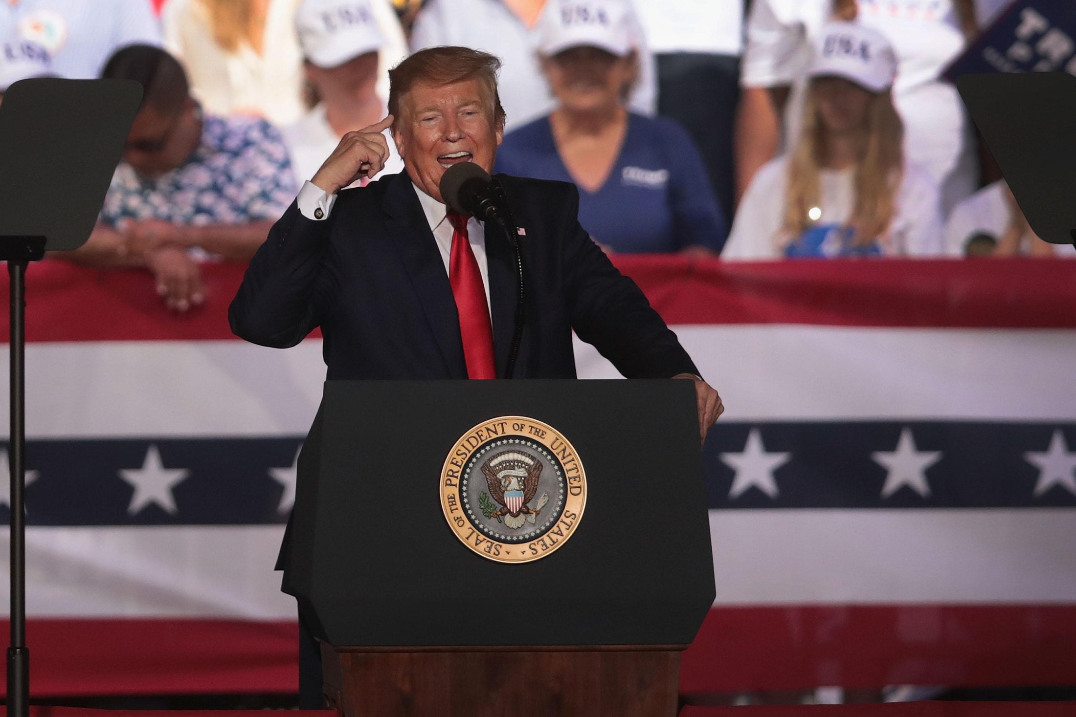 Trump Laughs Off Audience Suggestion To Shoot Migrants At The Border