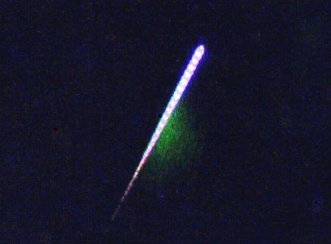 Video shows two meteors burning up as seen from space.