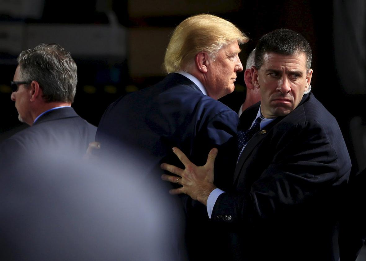 Watch secret service agents surround Trump as man tries to rush ...