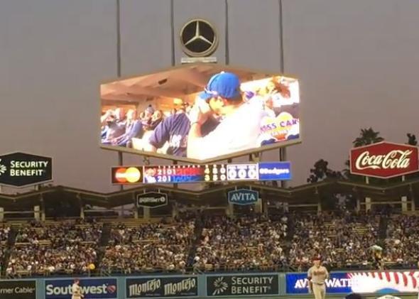Dodgers gay kiss cam moment draws cheers from baseball fans (video).