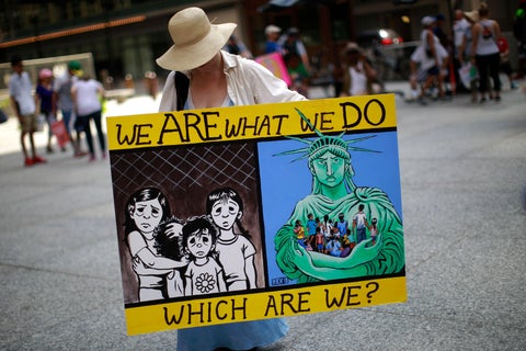 Best signs from the national zero policy immigration protests.
