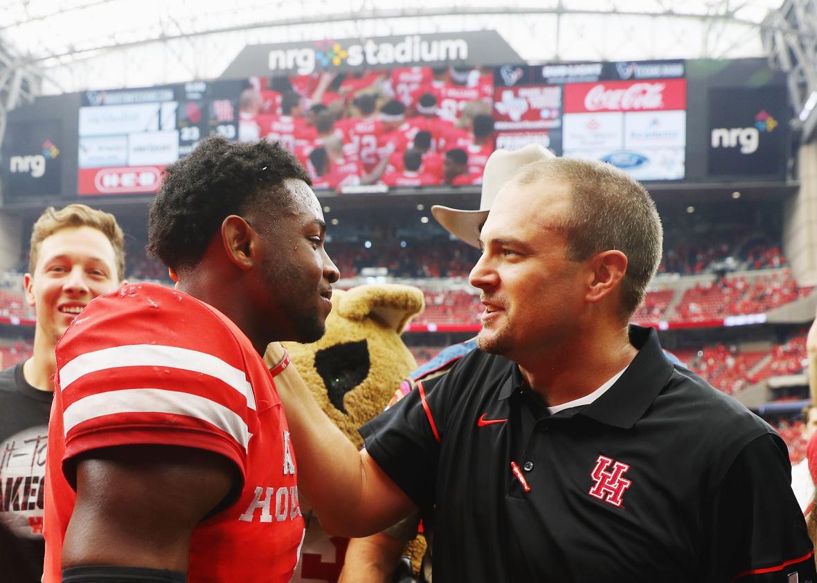 This college football coach kisses his male players before each game.
