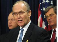 Slate editors squabble about Idaho Sen. Larry Craig's bathroom arrest.