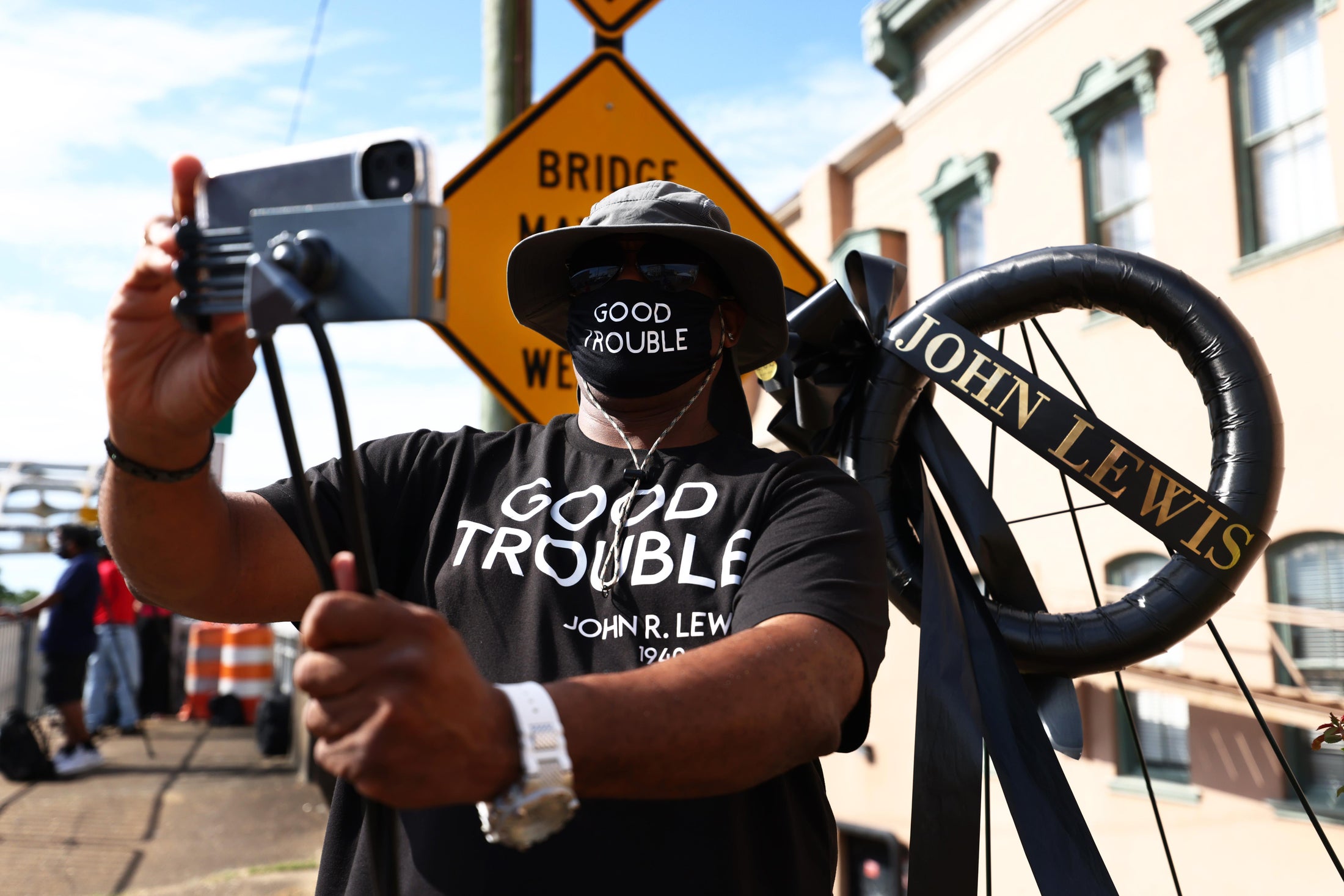 John Lewis makes final crossing of Edmund Pettus Bridge.