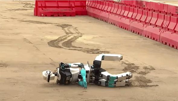 Robots falling over at the DARPA Robotics Challenge.