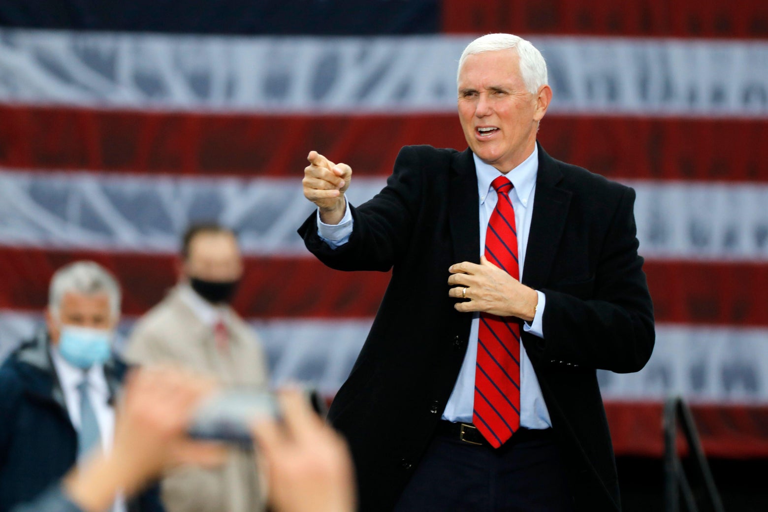Pence keeps campaigning after close aides test positive for the ...