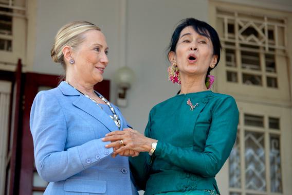 Holding Hillary Clinton's Hand Caption Contest