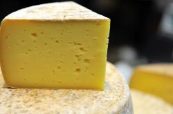 Why is cheese yellow or orange when milk is white?