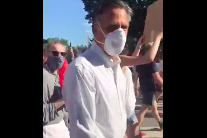 Mitt Romney says “black lives matter” while marching in Washington protest.