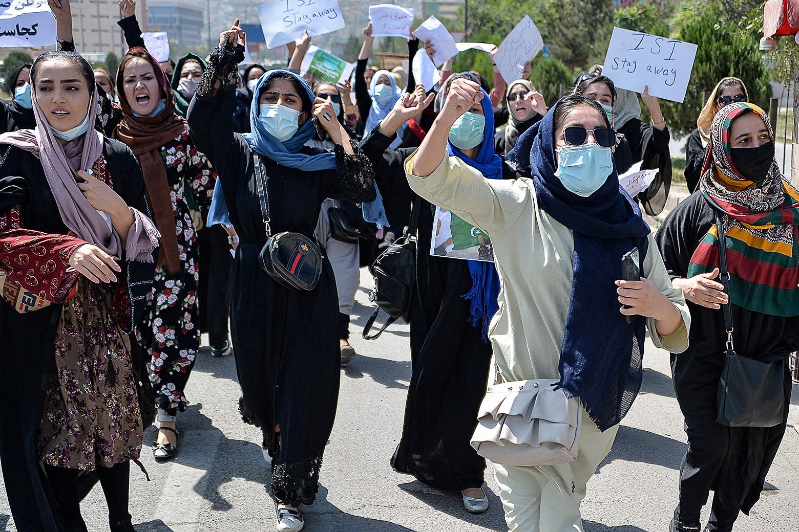Afghan women march in Kabul in defiance of Taliban.