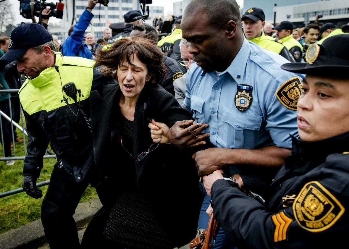 War crimes tribunal imprisons French journalist Florence Hartmann.