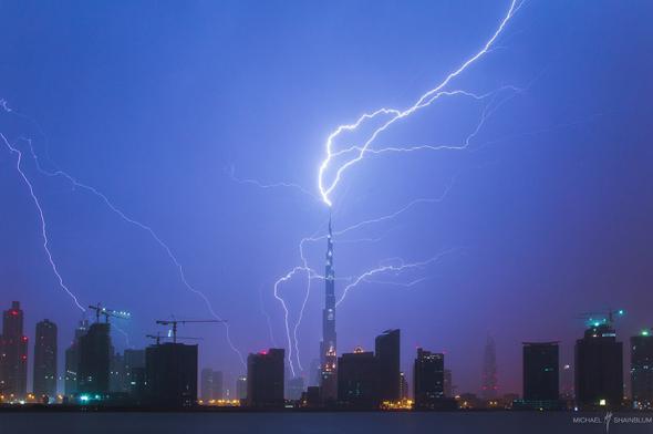 Photograph: Lightning strikes world's tallest building. Photograph: Lightning strikes world's tallest building.