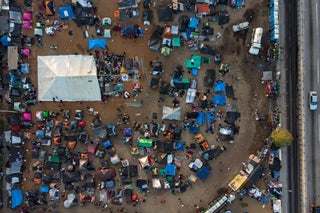 U.S. agents fire tear gas at migrants approaching the border from Mexico.