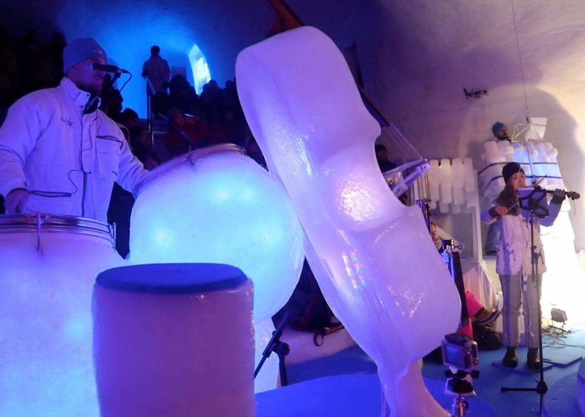 An orchestra of ice instruments plays beautiful music in an igloo in ...