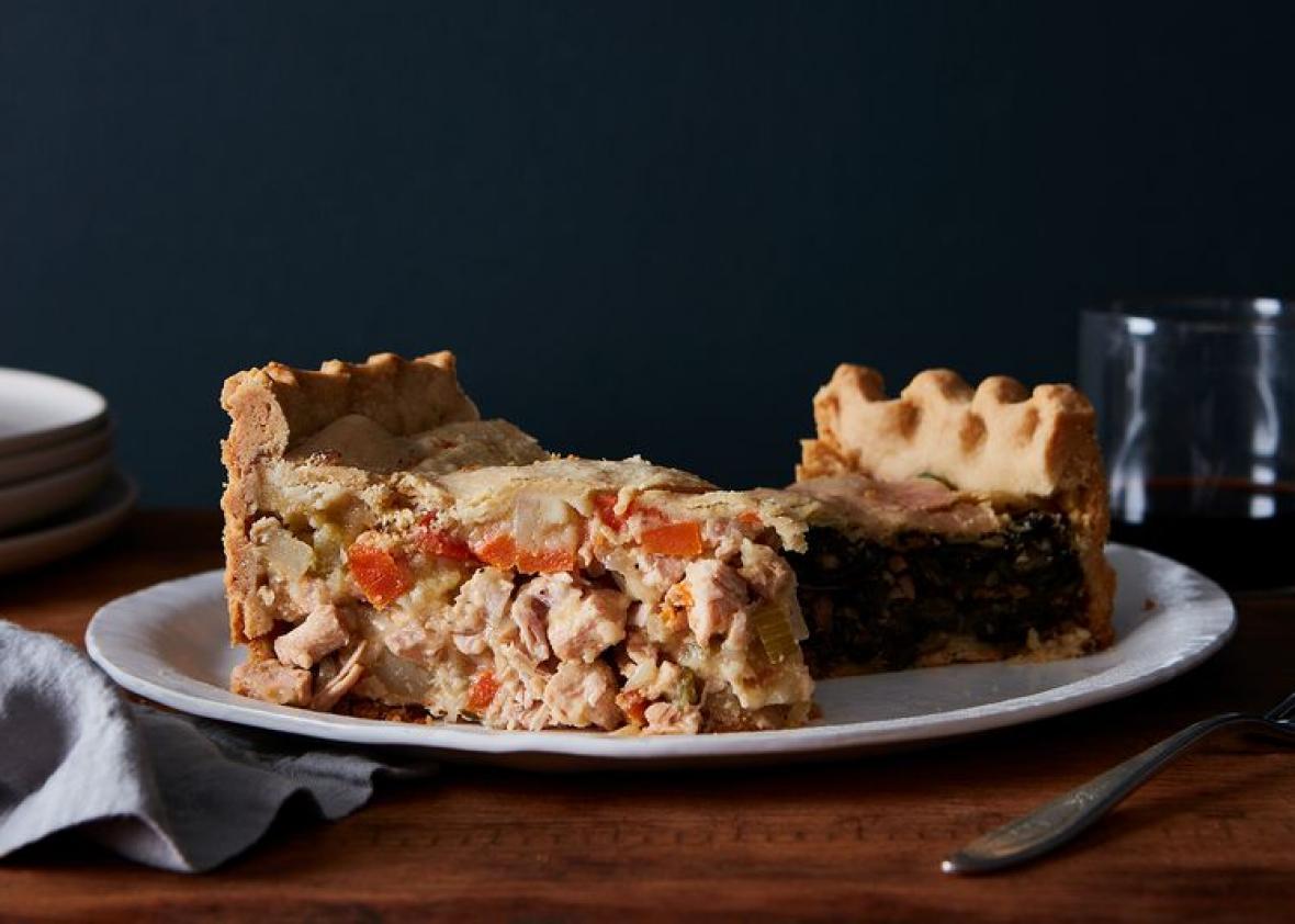 A three-tiered pie: turkey, kale, cranberry.