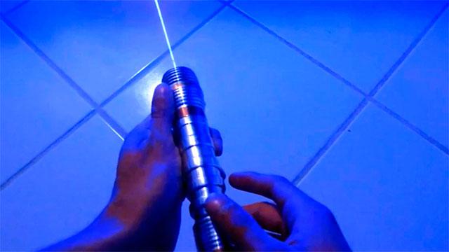 Homemade Lightsaber: Real-life laser weapon destroys paper and pingpong ...