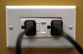 Wall socket buttons: What do the "test" and "reset" outlet buttons do?