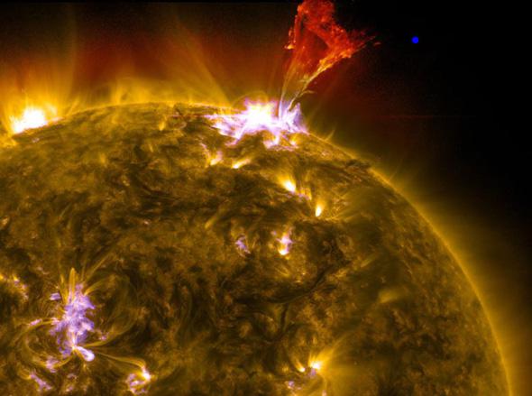 Solar wind versus fusion: How does the Sun lose mass?