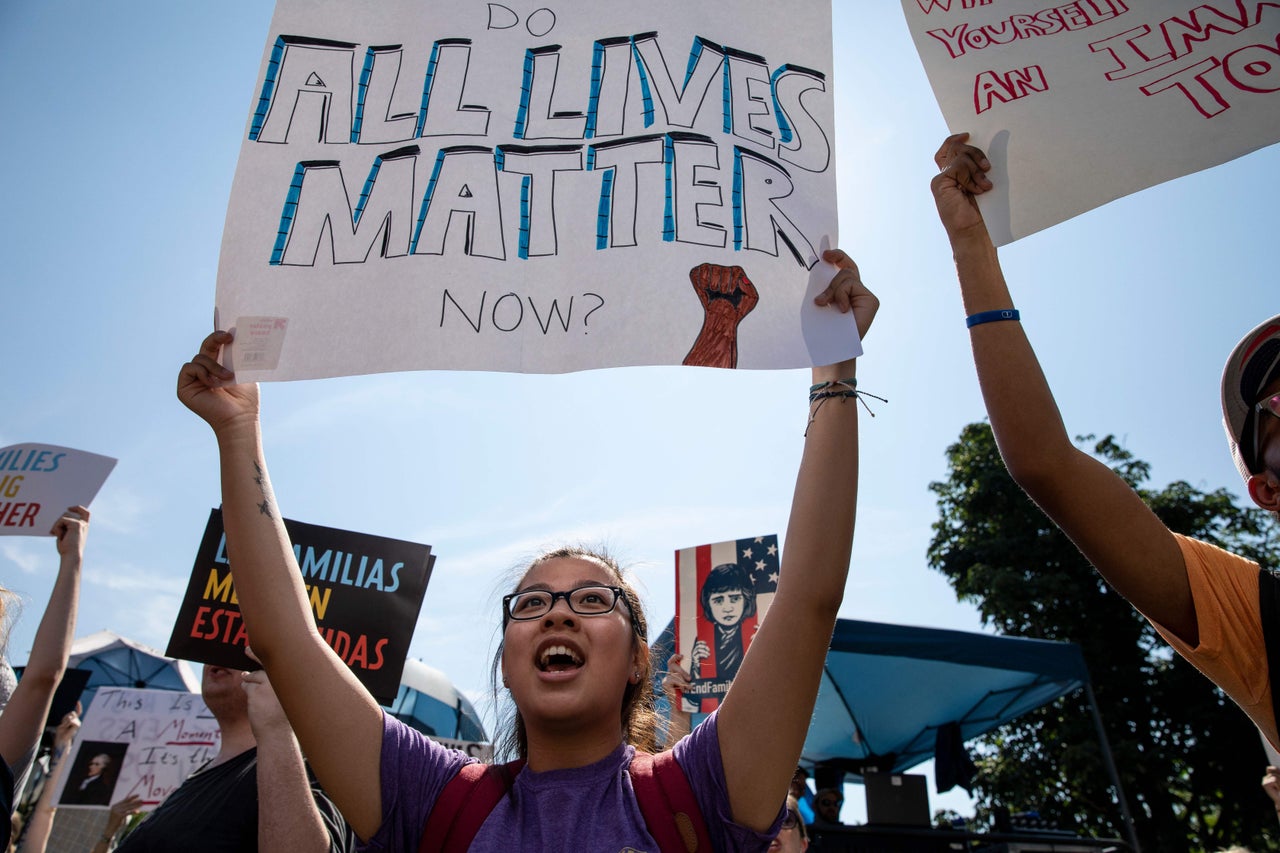 Best signs from the national zero policy immigration protests.