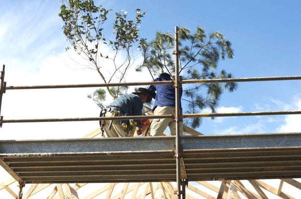 Why do construction workers top building sites with undecorated ...