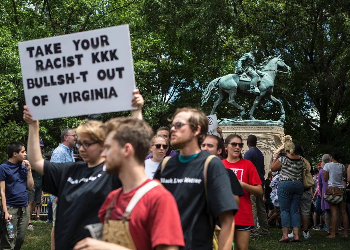 KKK Charlottesville rally of around 50 people met by more than 1,000 ...