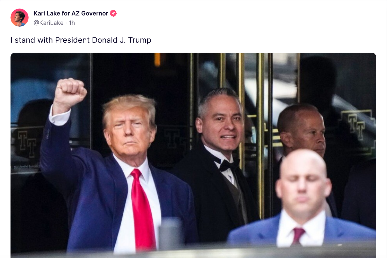 The Trump raised-fist photo from his arraignment was the defiant meme ...