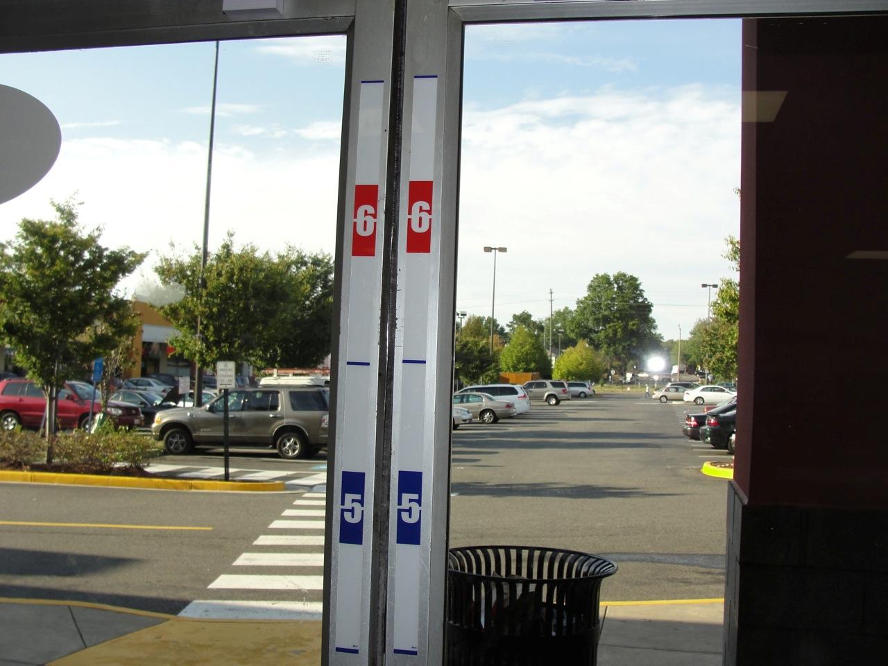 Height strips in convenience store: What are they for?