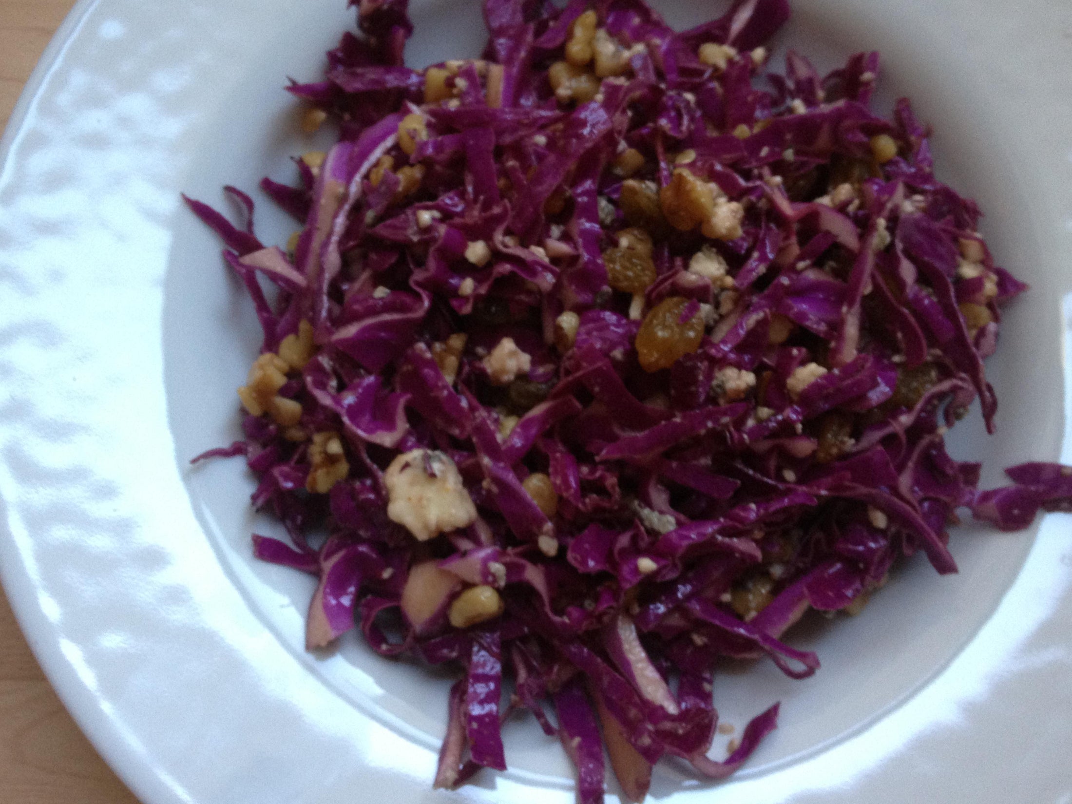 The Best Red Cabbage Salad Recipe with Blue Cheese, Walnuts, and Raisins